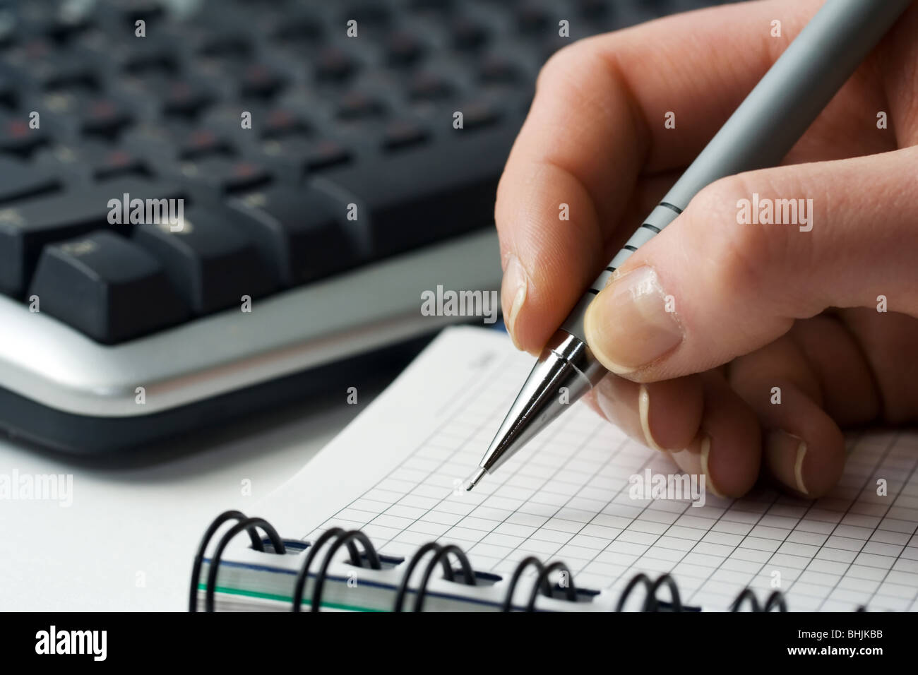 Female hand writing Stock Photo - Alamy