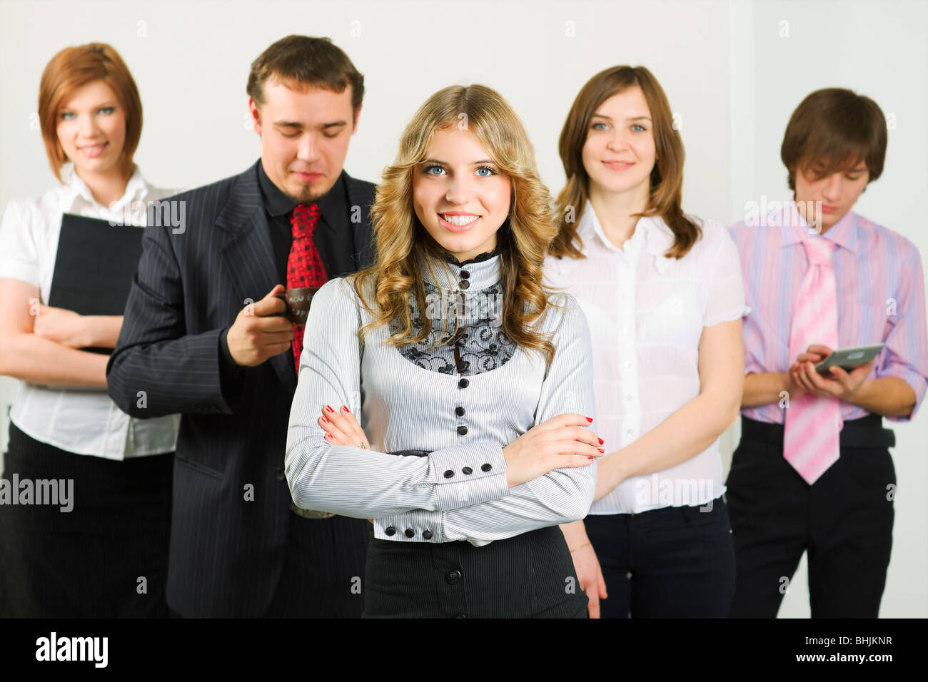 Young business team Stock Photo - Alamy
