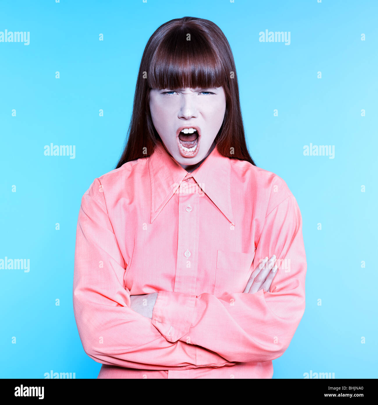 studio portrait of a young screaming woman on isolated background Stock ...