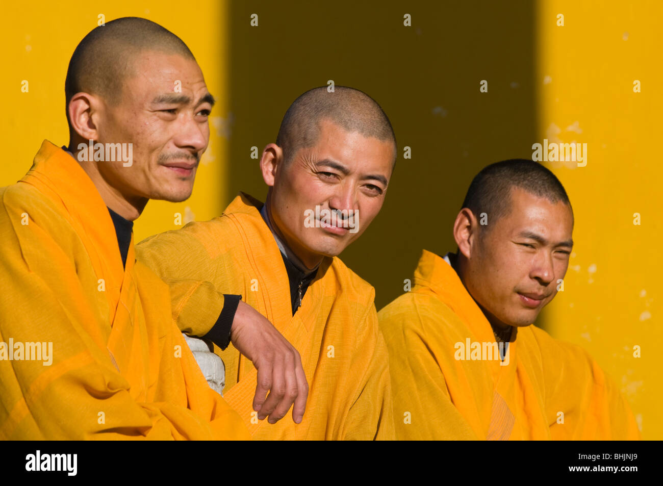 Three monks at Jinshan Temple in Zhenjiang, Jiangsu province, China ...