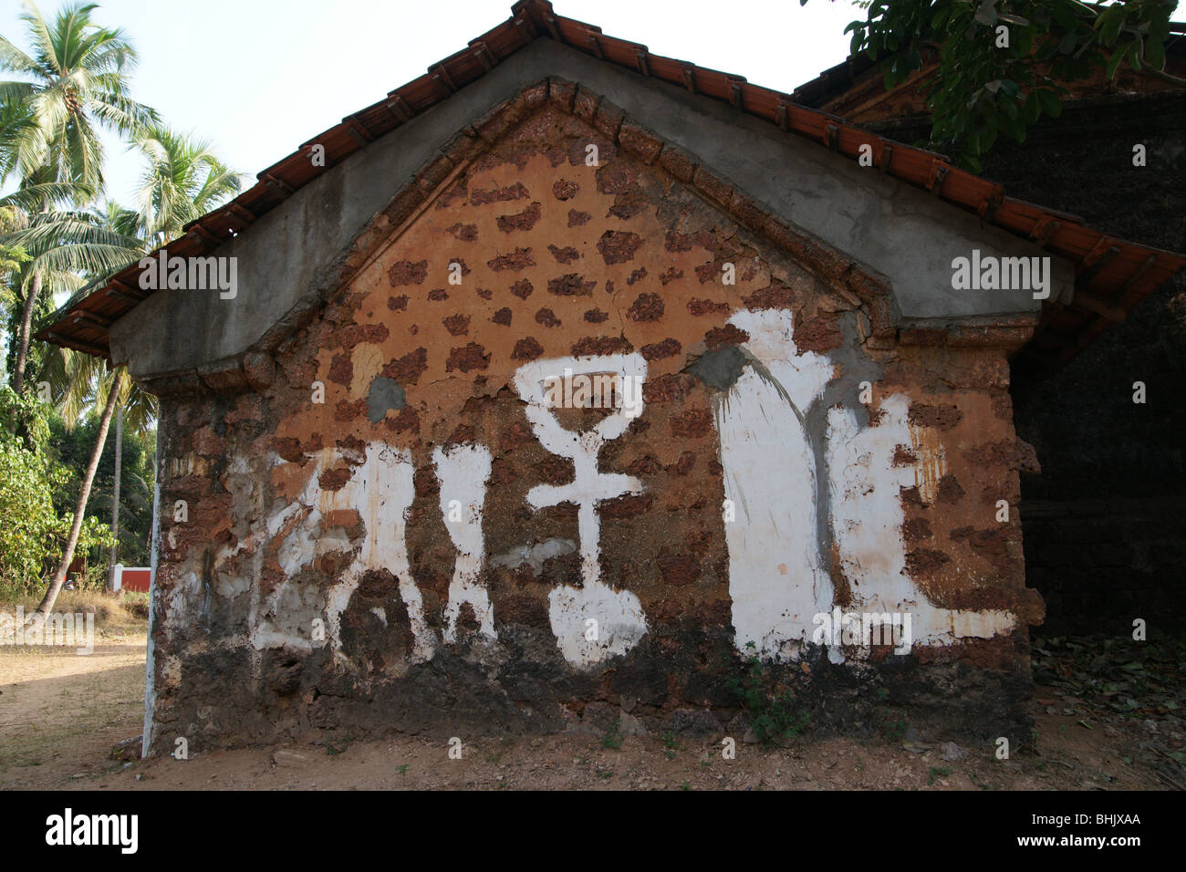 Ancient symbols on the back of the church in Arpora Goa India Stock ...