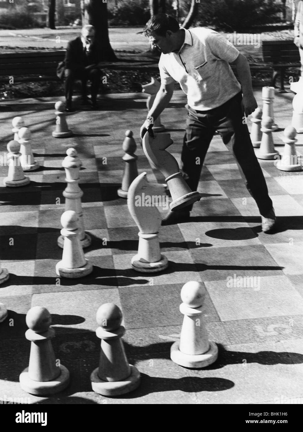 Chess board in park Black and White Stock Photos & Images - Alamy