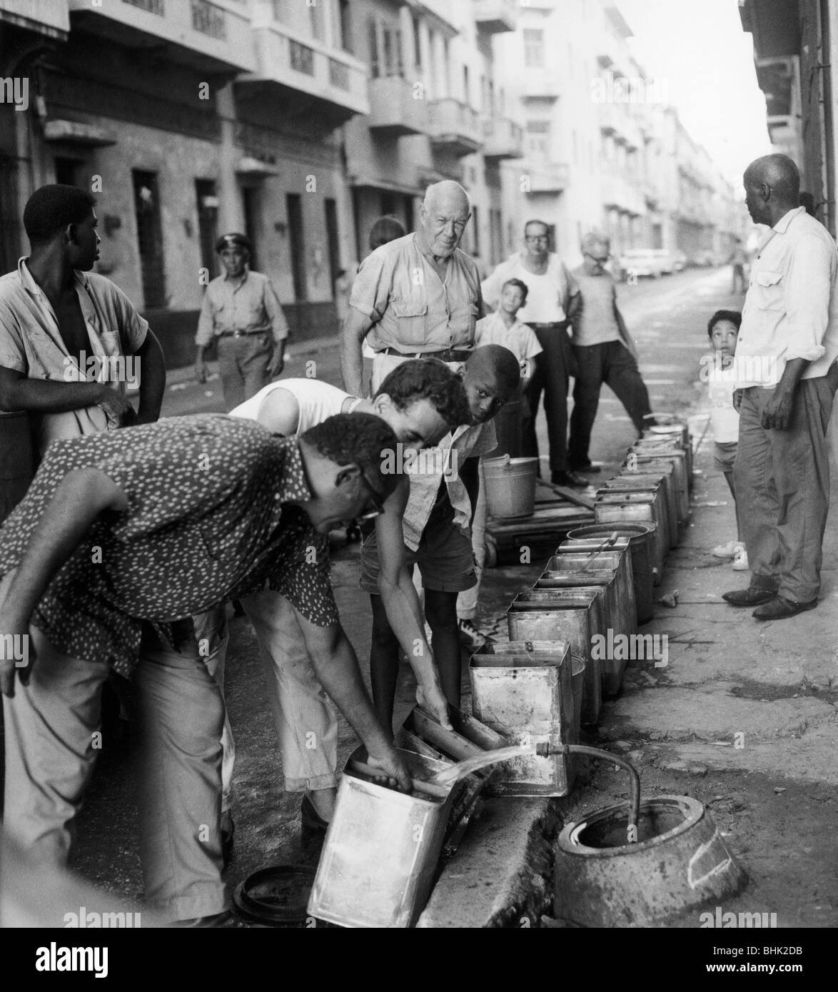 geography / travel, Cuba, people, men getting water from a standpost ...