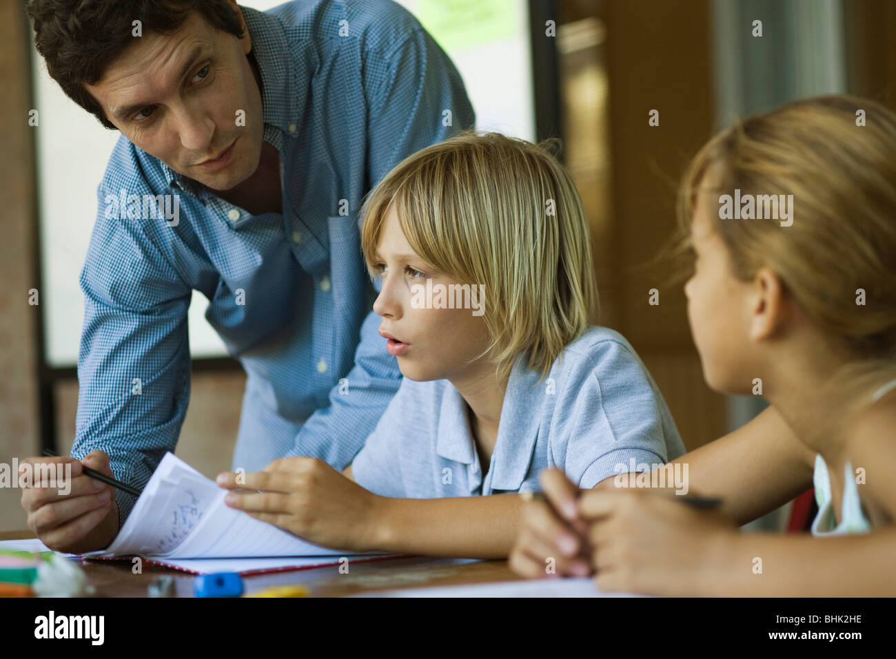 Students helping other classroom hi-res stock photography and images ...