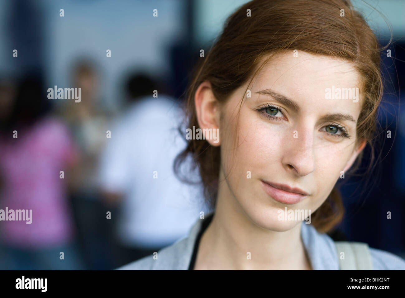 Young woman looking at camera with inquisitive look, portrait Stock ...