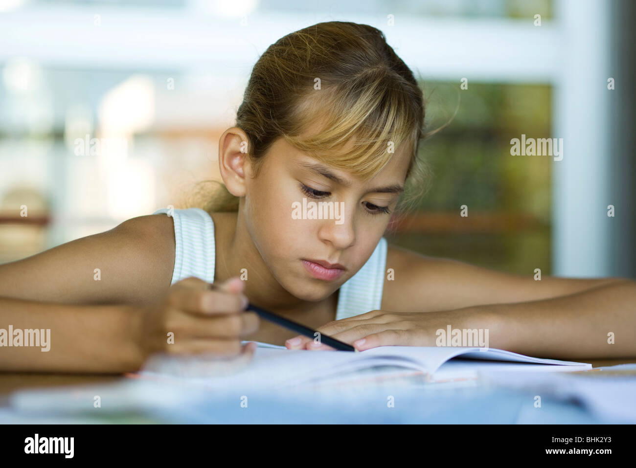 Junior high school girl reading book hi-res stock photography and ...