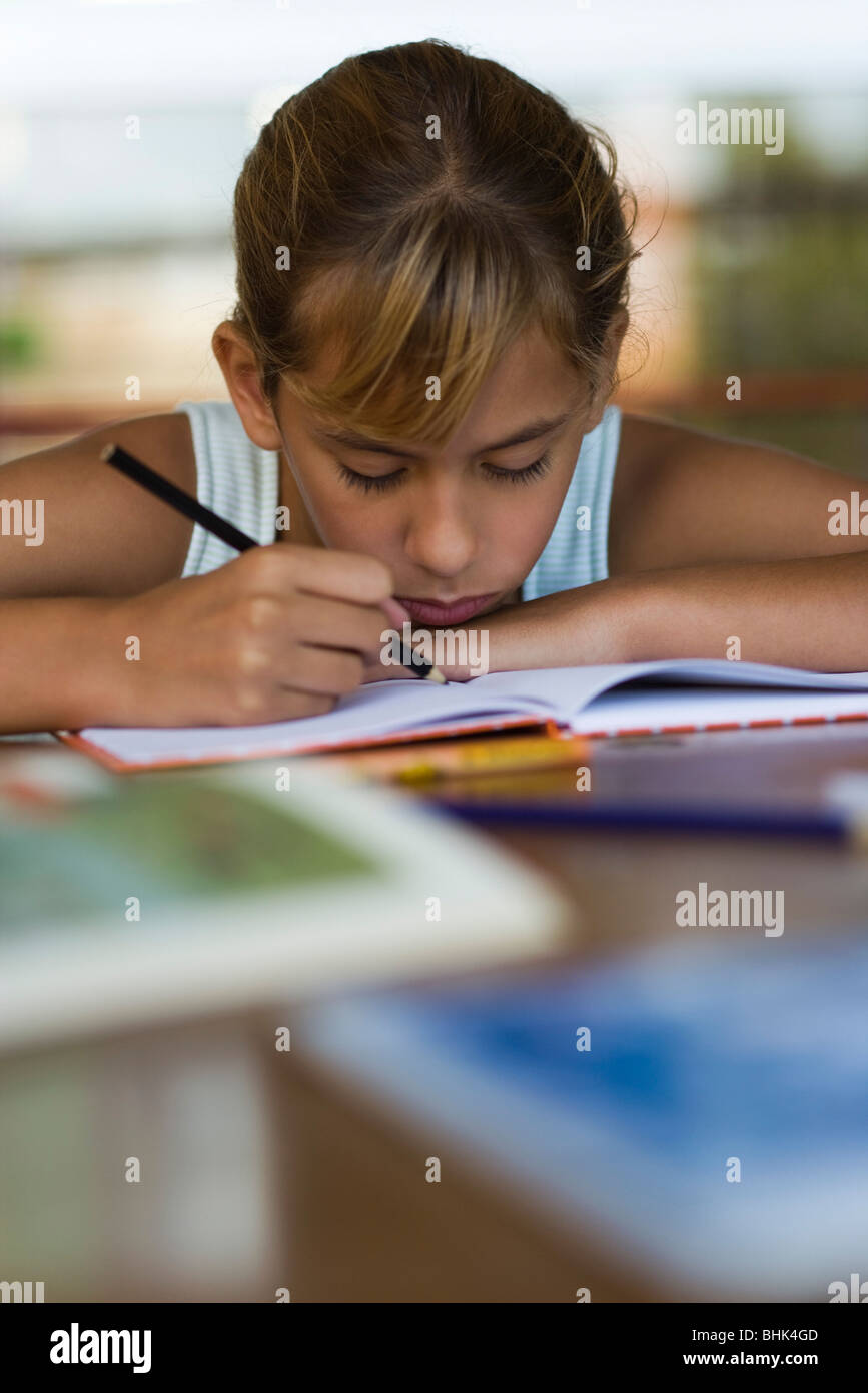 Elementary school student concentrating on school work Stock Photo - Alamy