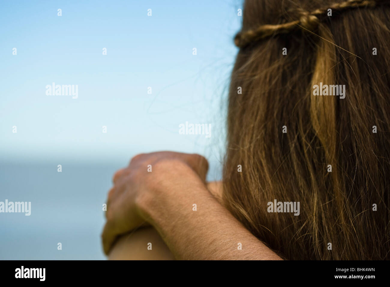Couple, man's arm around woman's shoulder, cropped Stock Photo - Alamy