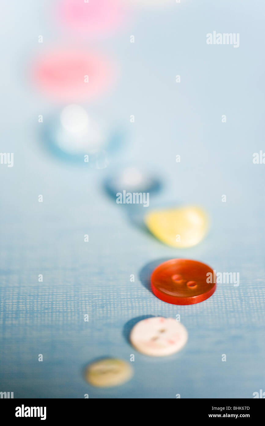 Buttons arranged in a row Stock Photo - Alamy