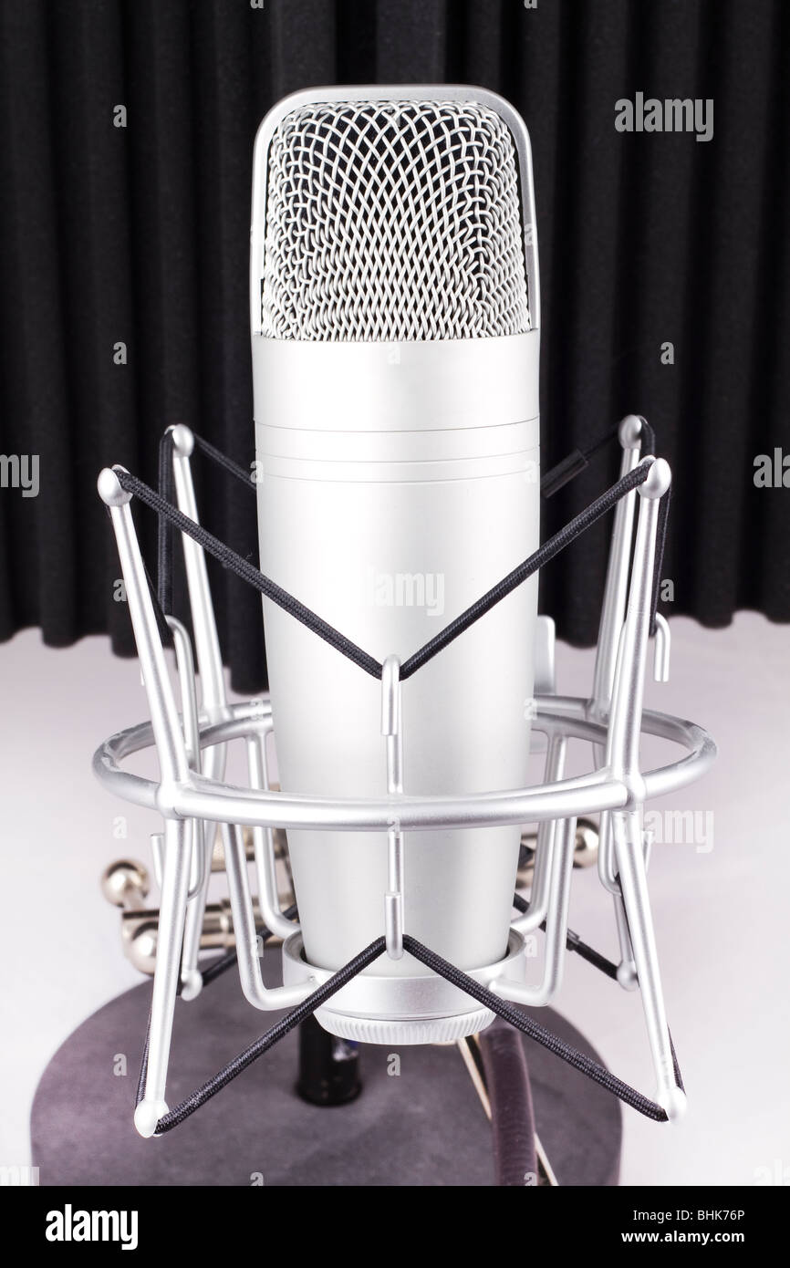 Professional studio microphone on white background Stock Photo - Alamy