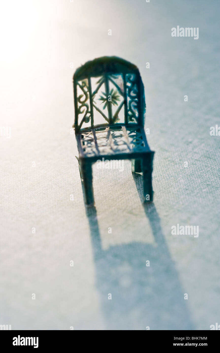 Miniature plastic chair Stock Photo - Alamy