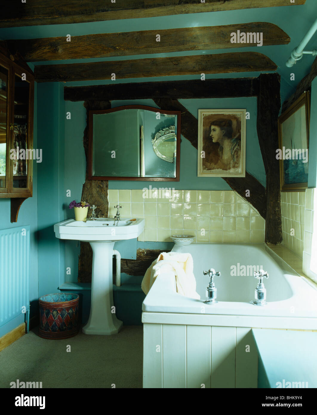 Small pale turquoise cottage bathroom with beamed ceiling and white ...