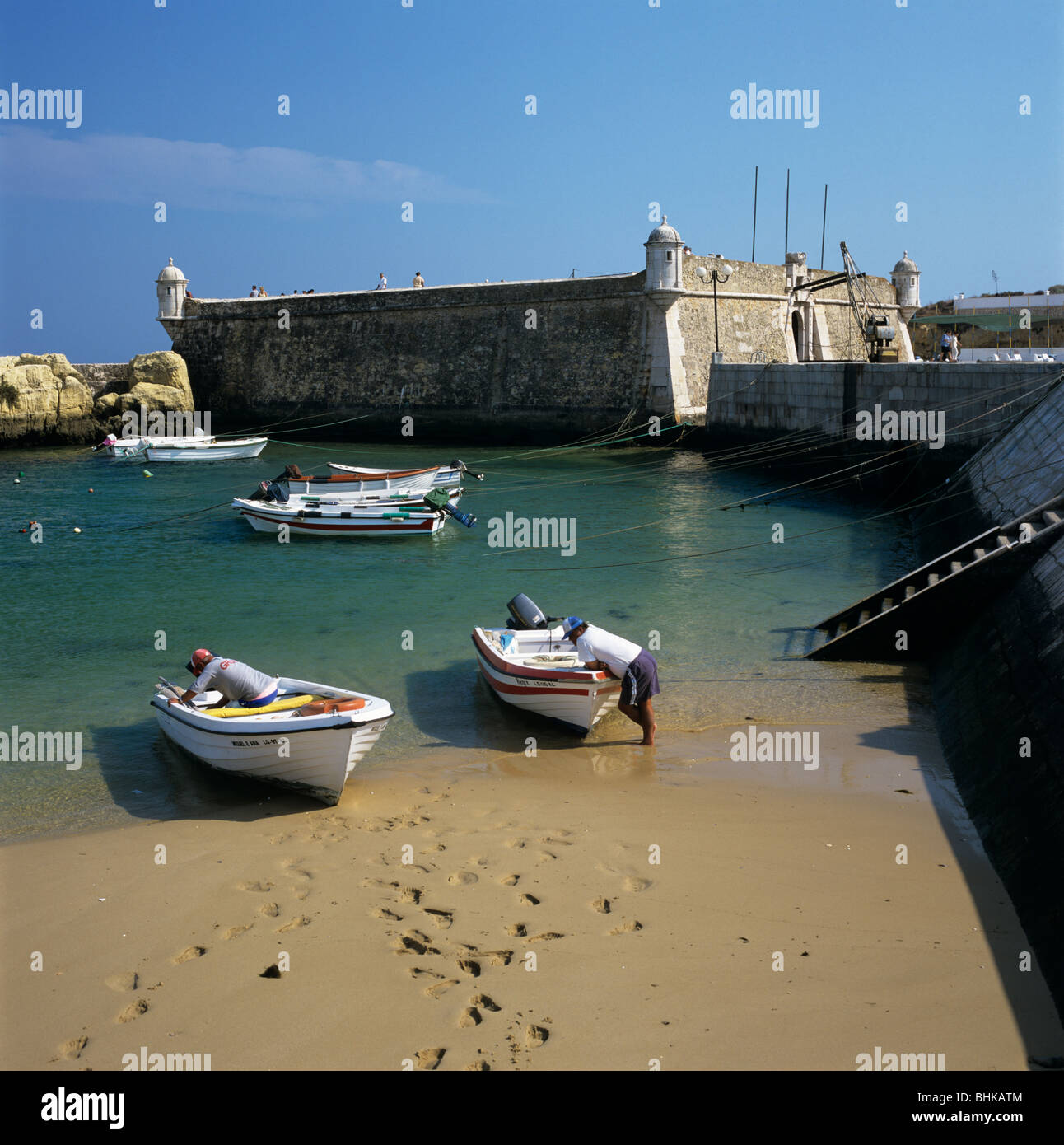 Sightseeing boats below Forte da Ponta da Bandeira (Fort at Flag Point ...