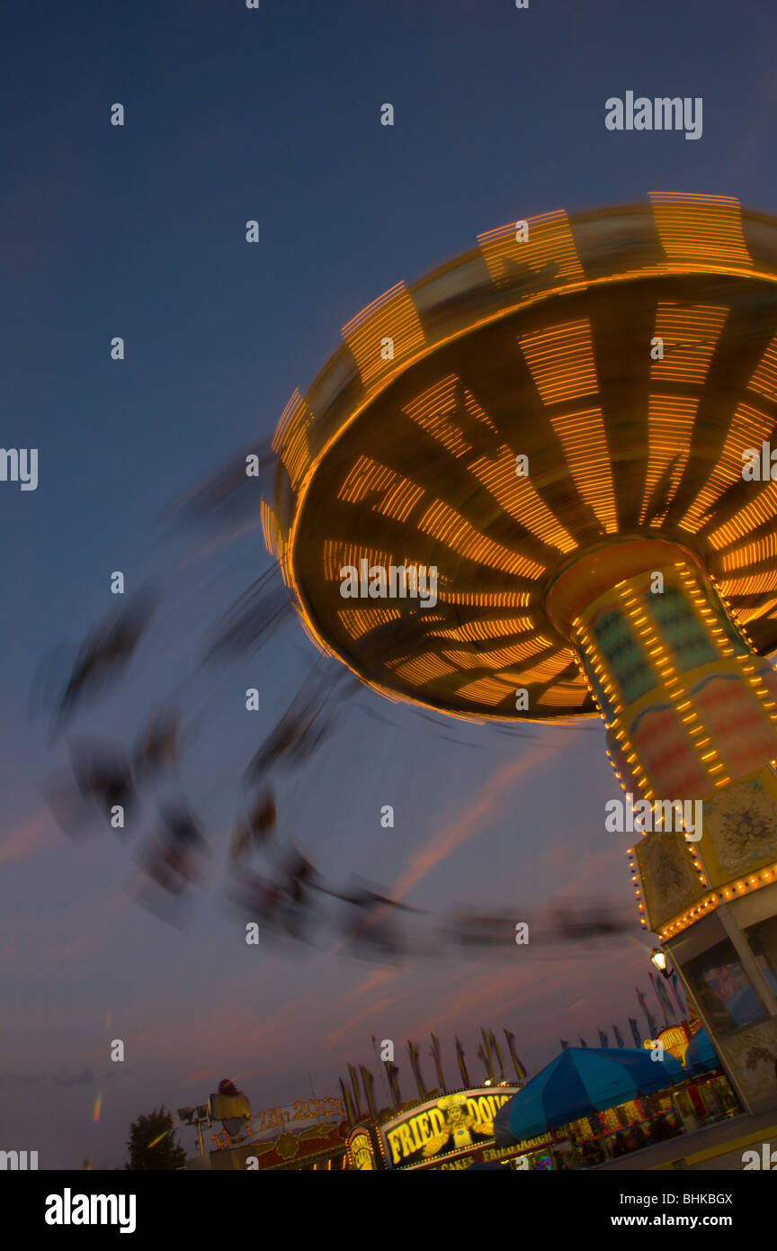 State Fair ride at dusk Stock Photo - Alamy