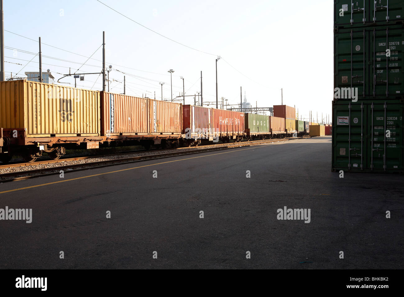 Freight Train on Railroad with Cargo Containers Stock Photo - Alamy