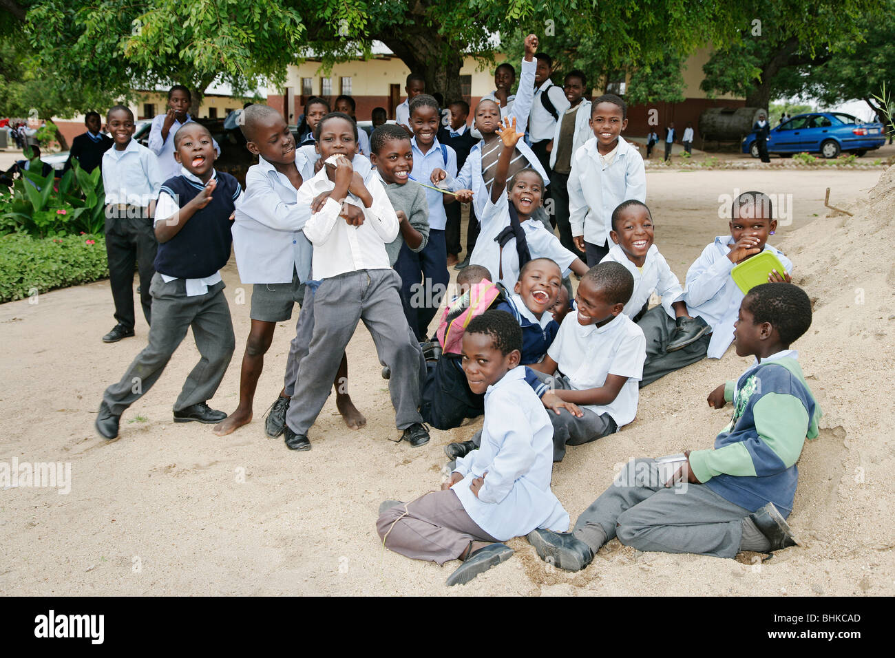 Black South African School children posing in their school yard Stock ...