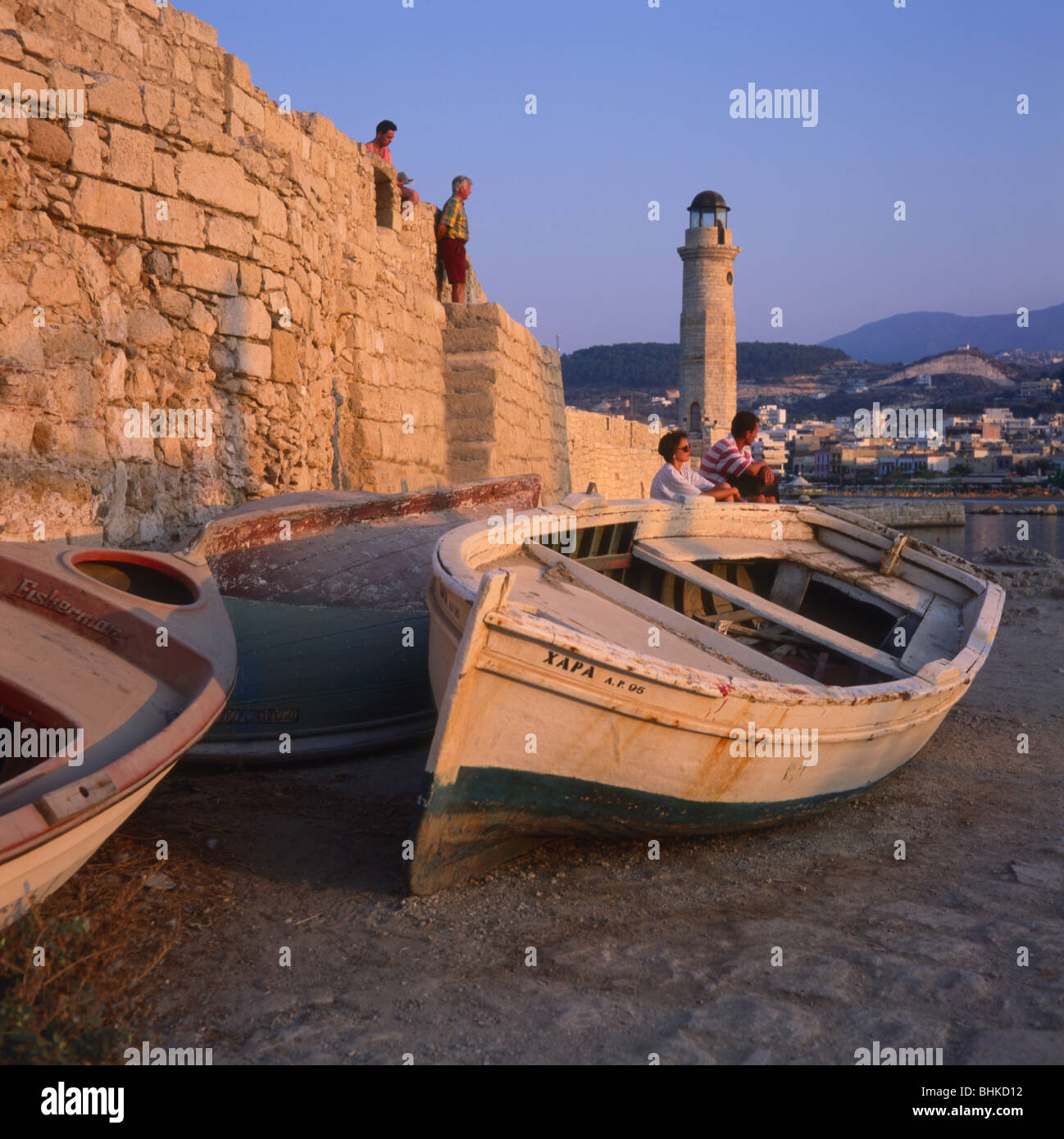 On the Harbour Wall at Sunset Stock Photo - Alamy