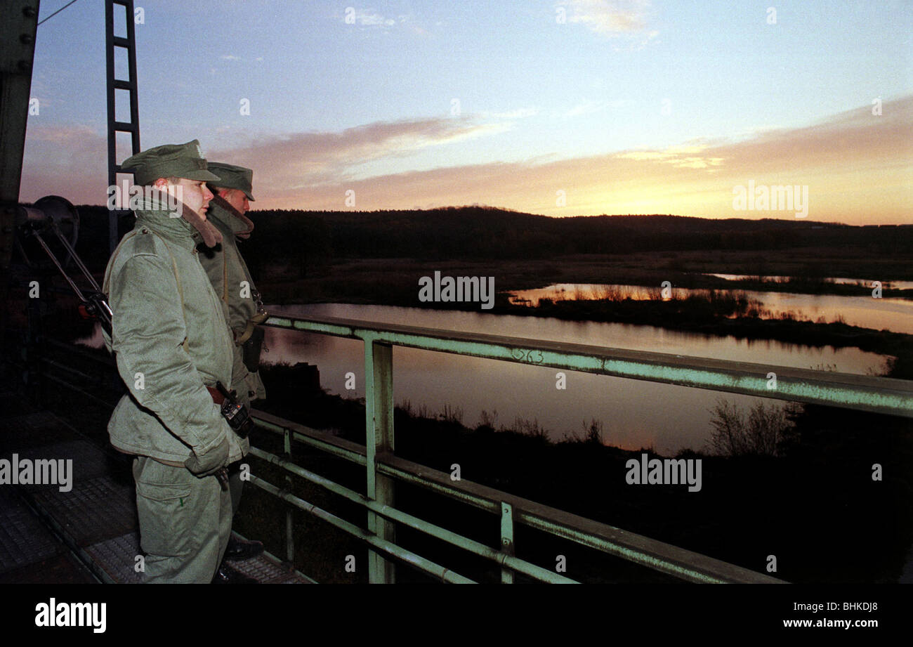 Polish border guard officers on patrol at daybreak at the Polish-German ...