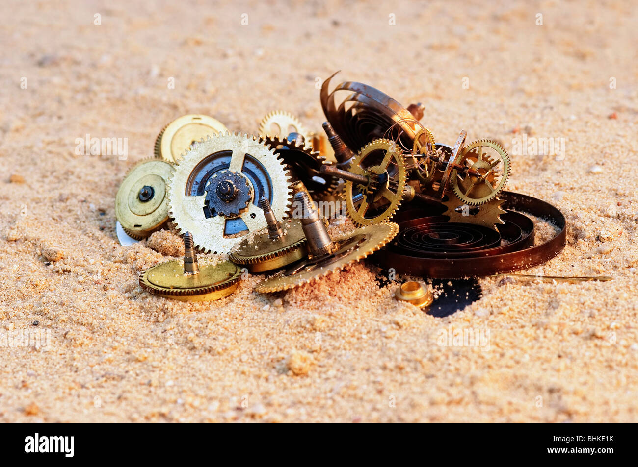 parts of clockwork mechanism on the sand Stock Photo - Alamy