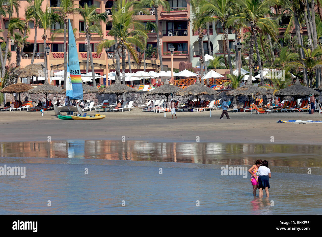 Beach at Mexico, Mazatlan with sailboat. Sports, recreation and relax ...