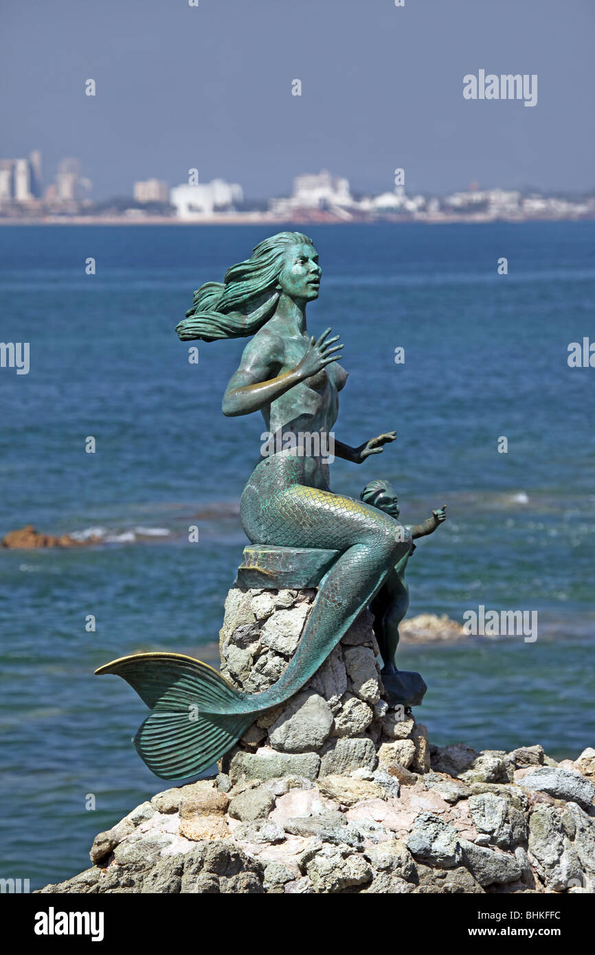 Mermaid statue on the Malecon along beach of Mazatlan, Mexico. Bronze ...