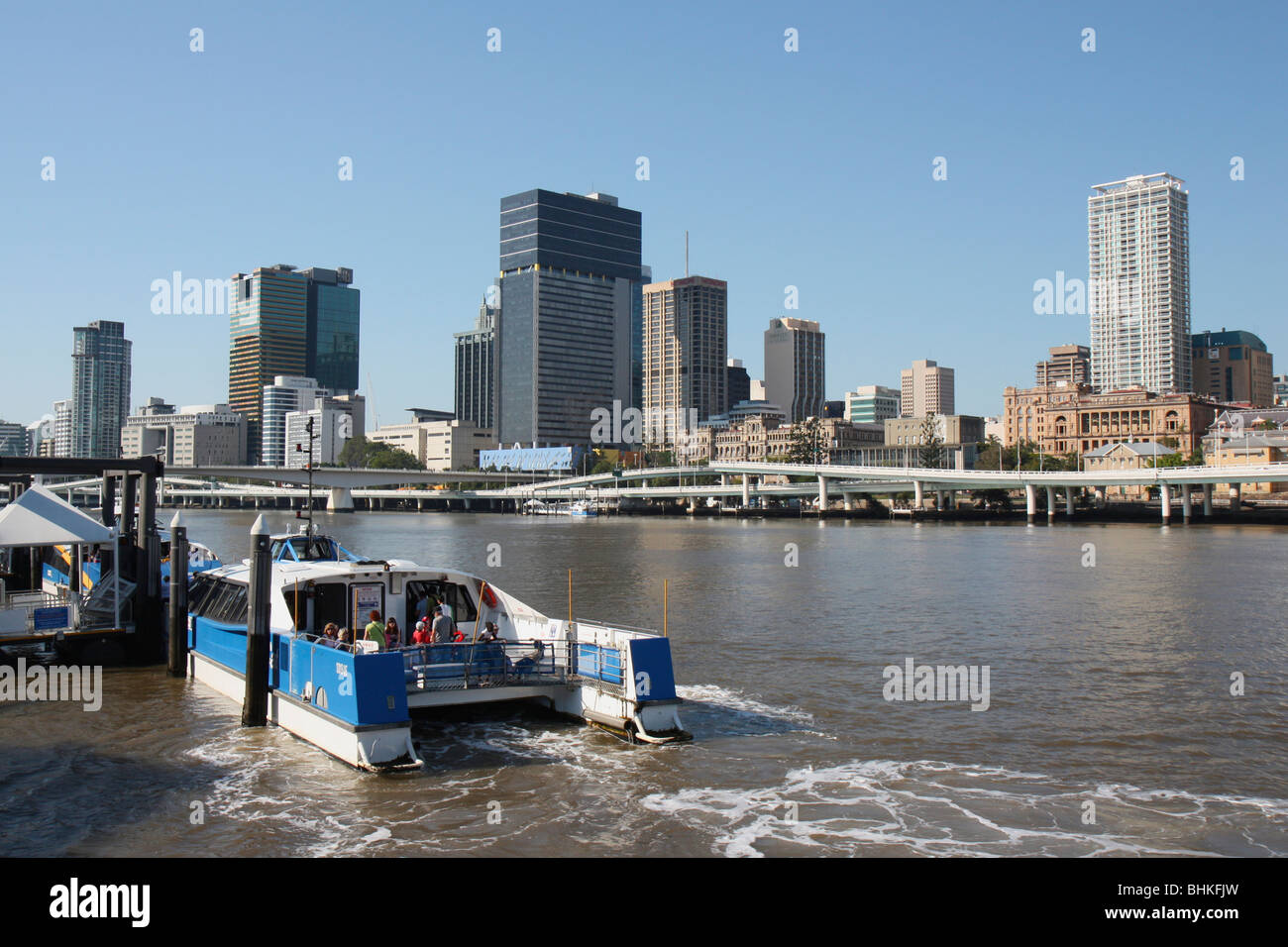 Brisbane City Centre and City Cat Ferry on Brisbane River in Queensland ...