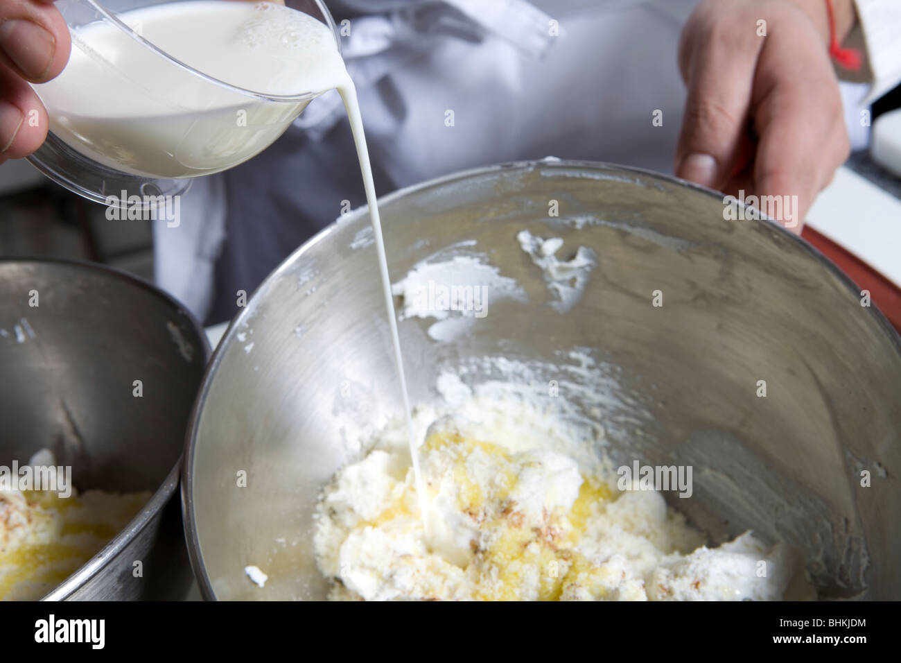 pouring milk in pastry Stock Photo - Alamy
