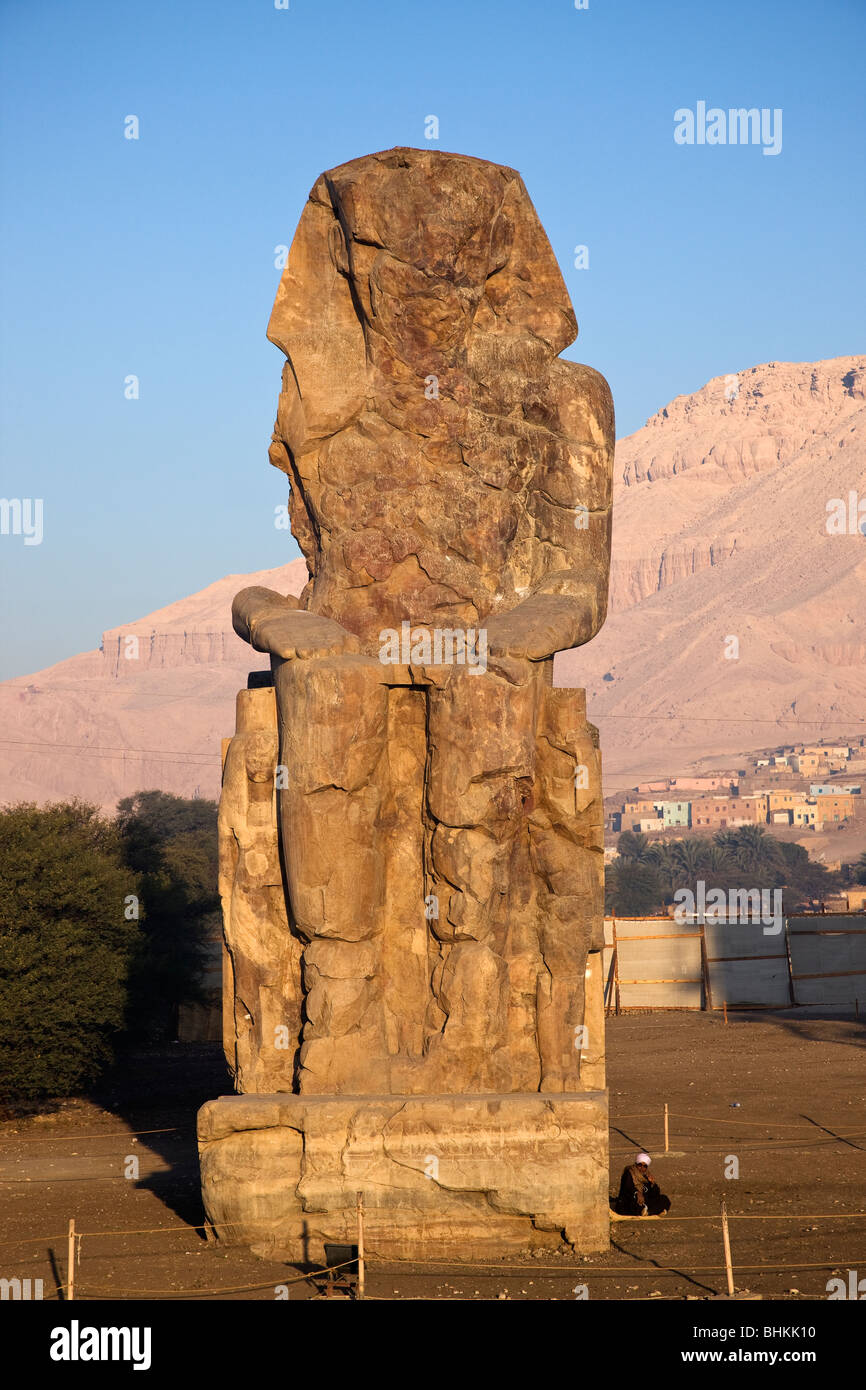 The west Colossus of Memnon, statue of Amenhotep III Stock Photo - Alamy