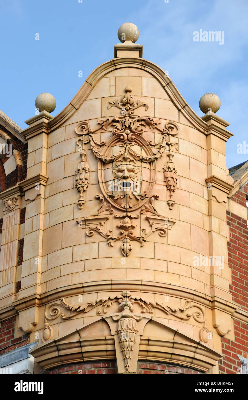 Carving on building facade Stock Photo - Alamy