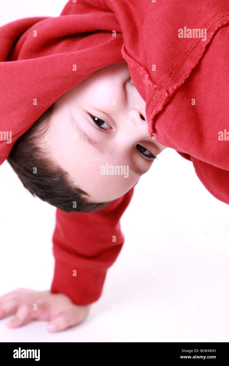 Boy in red hooded top Stock Photo - Alamy