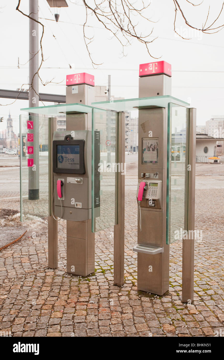 Row of public telephone booths with modern design, equipped with ...