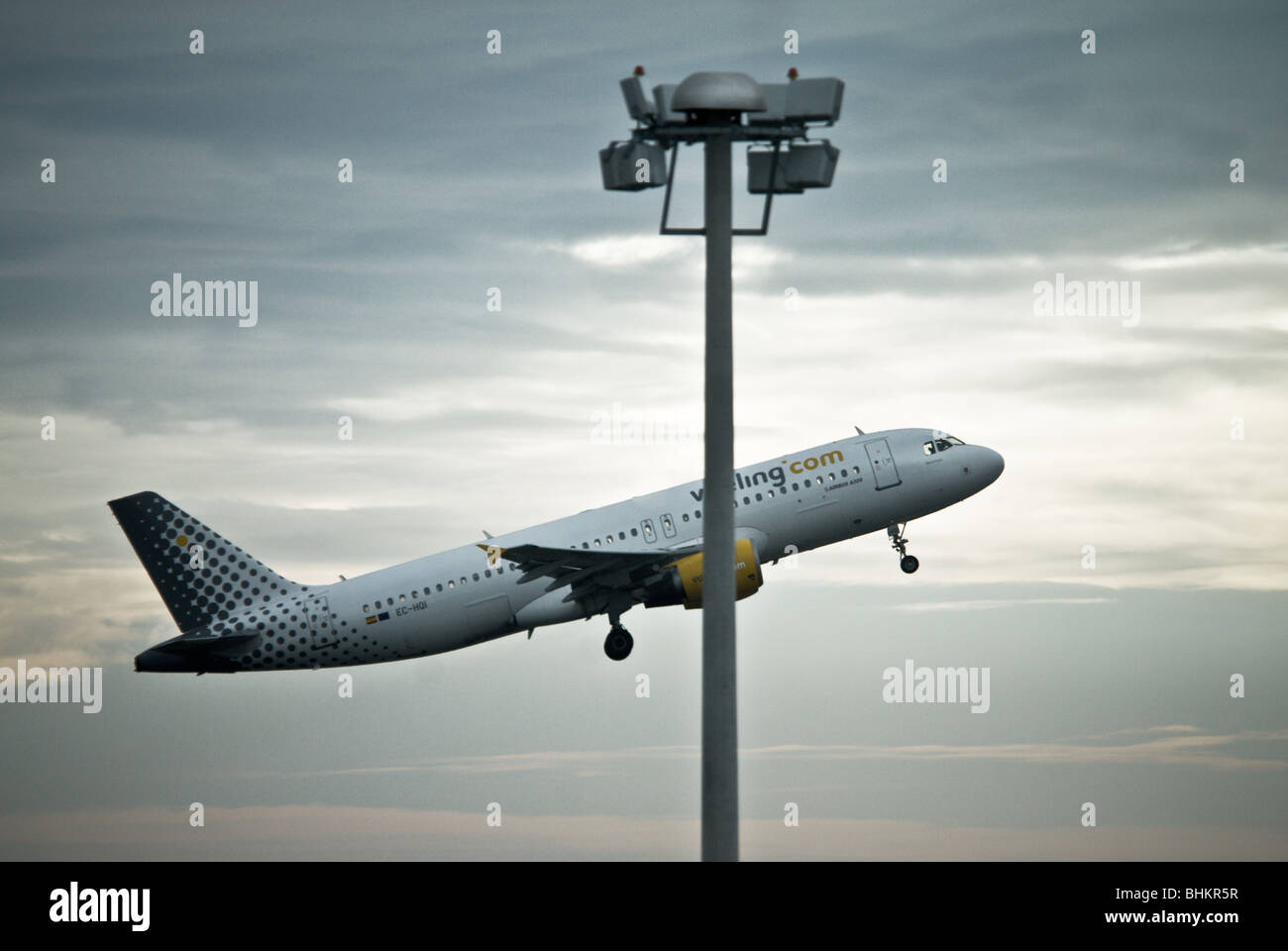 A plane takes off from an airport Stock Photo - Alamy