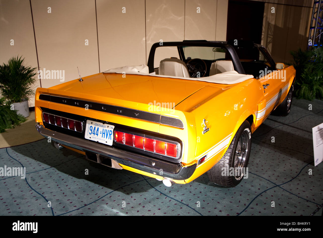 Rear view yellow vintage convertible Stock Photo - Alamy