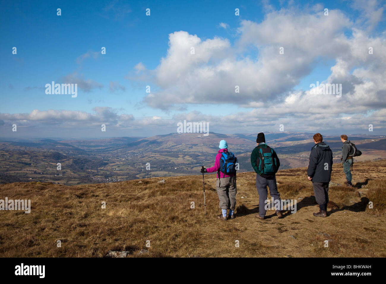 Four hikers admiring the view from the Blorenge Wales UK Stock Photo ...