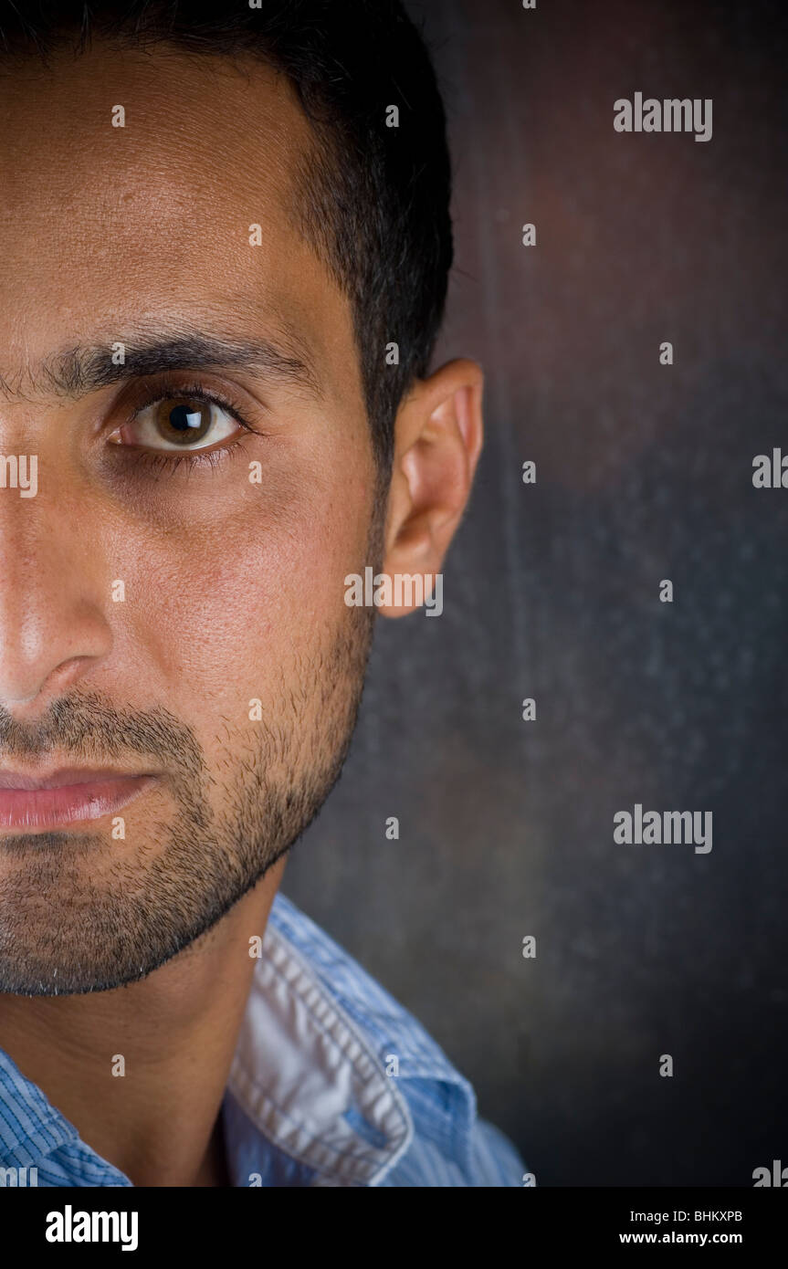 Close up portrait of a serious Arabic man staring Stock Photo - Alamy