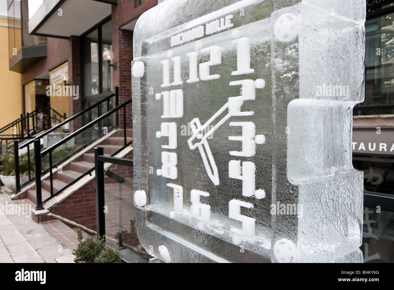 A close up view of a grand father clock ice sculpture Stock Photo - Alamy