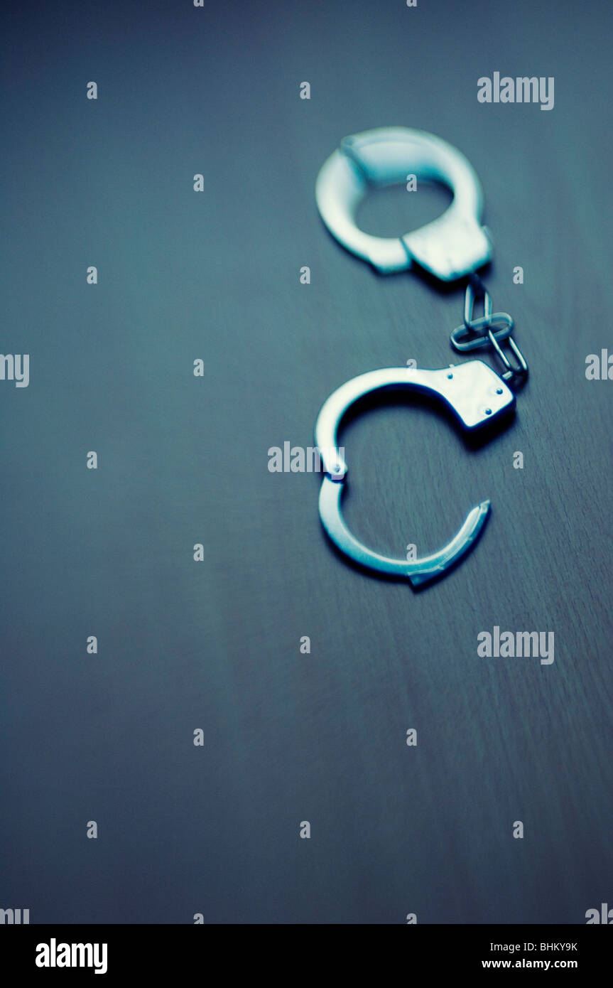 Jail prison handcuff hi-res stock photography and images - Alamy
