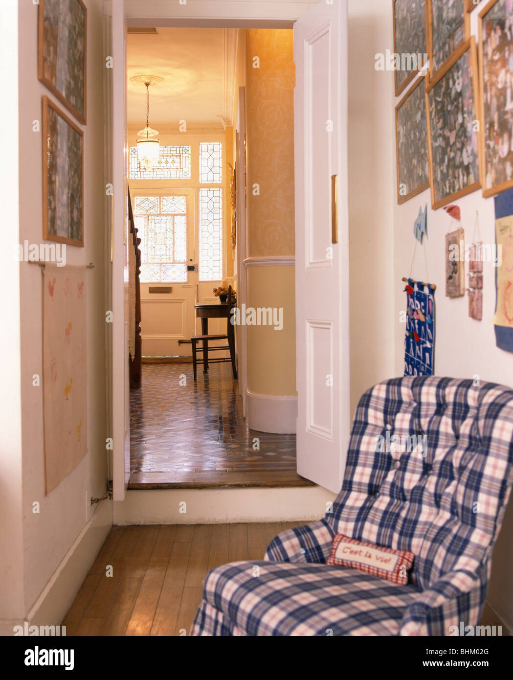 Blue checked armchair in small traditional hall Stock Photo - Alamy