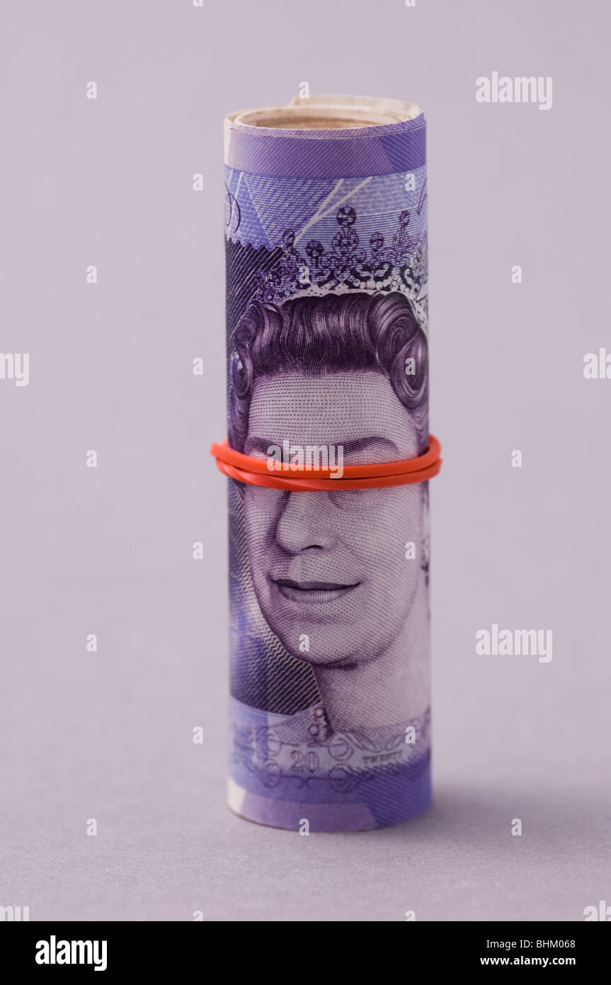 Roll of British money Stock Photo - Alamy