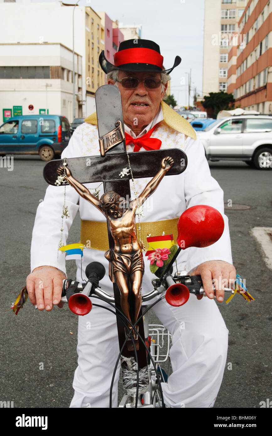 Man riding bike with Jesus on the cross bolted to handlebars at 2010 ...