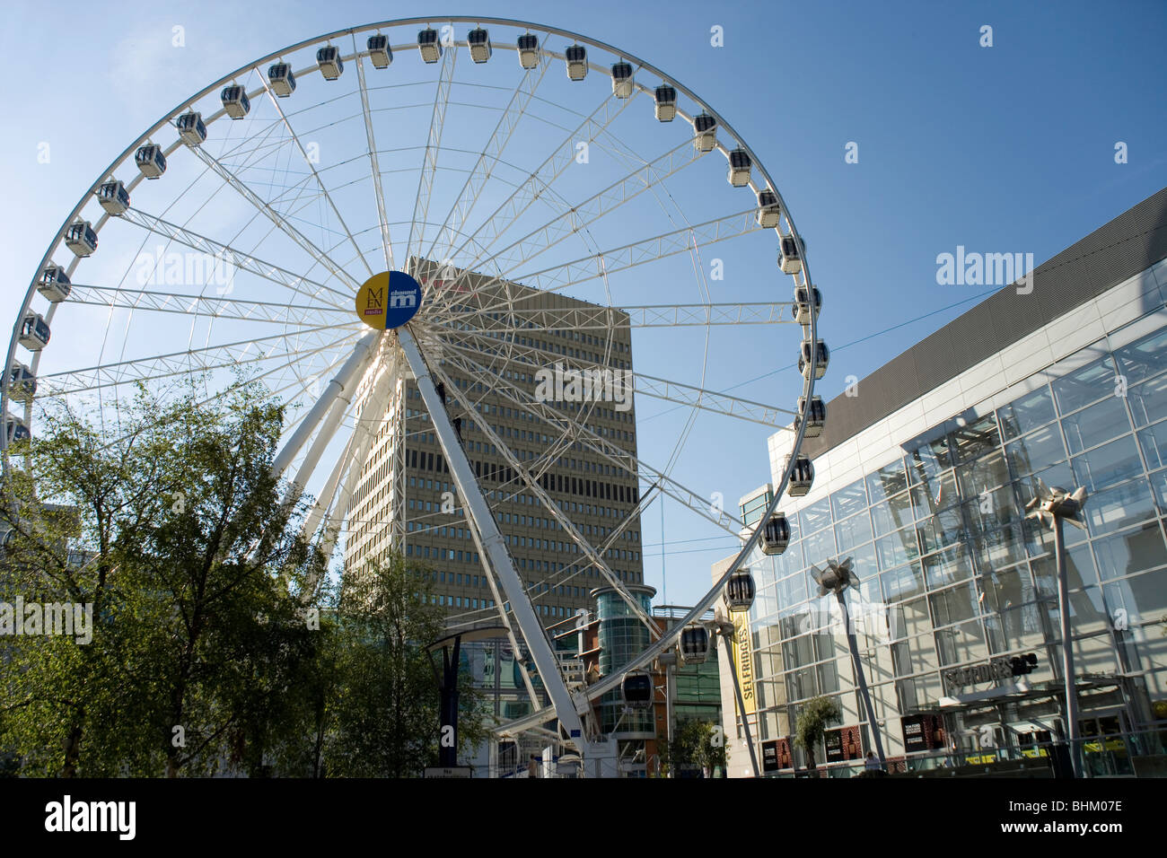 The Manchester Evening Wheel in Exchange Square with the Arndale ...
