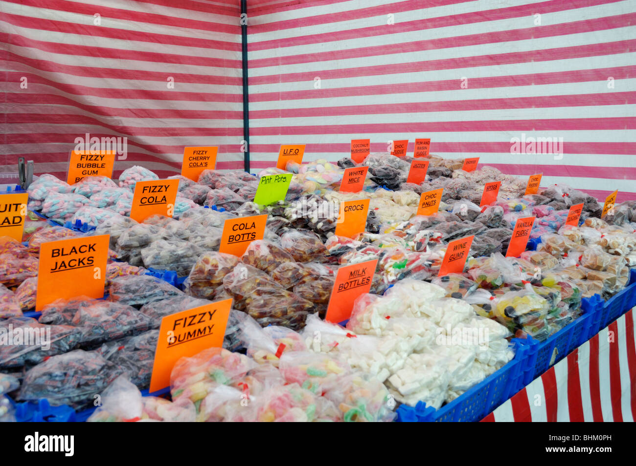 Assorted bags of sweets or candy on an English market stall in south ...