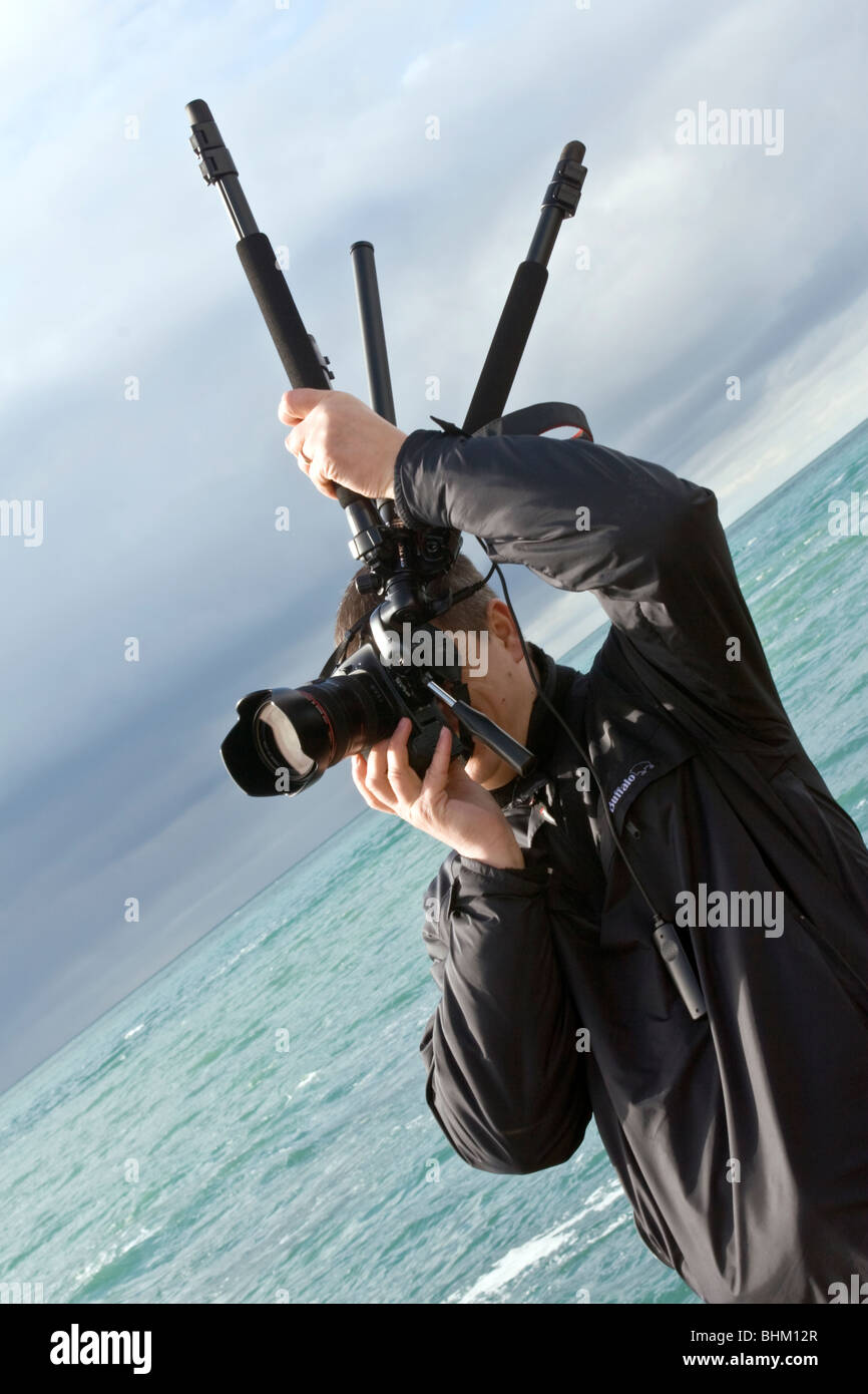 Photographer using a tripod hi-res stock photography and images - Alamy