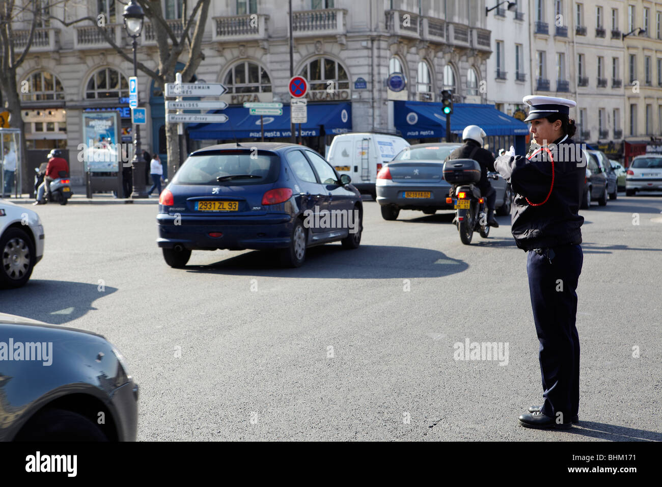 Traffic police directing traffic in Paris, France Stock Photo - Alamy