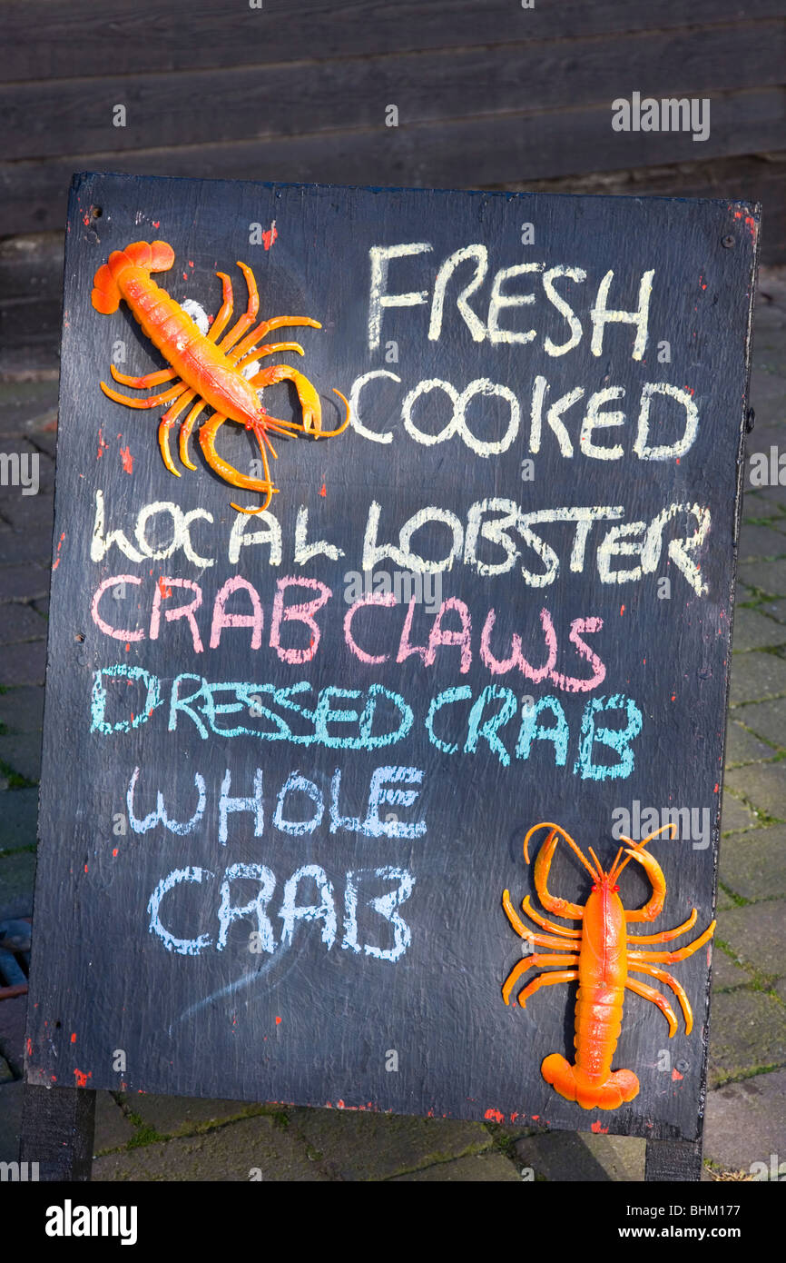 Hastings, East Sussex, England. Blackboard advertising freshly-cooked ...