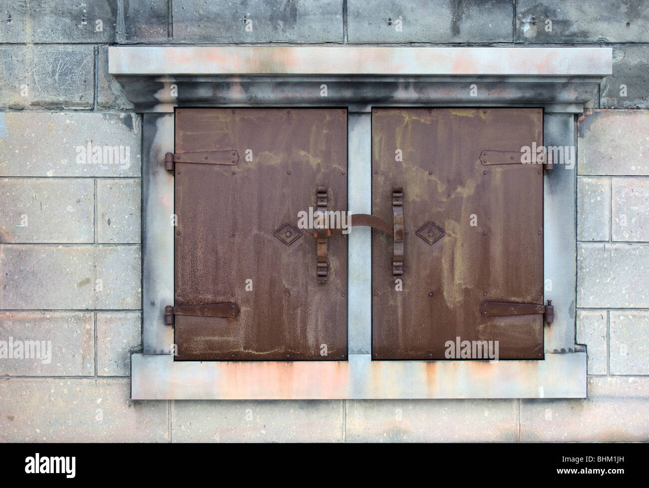 Old metal shuttered window in a stone building Stock Photo - Alamy