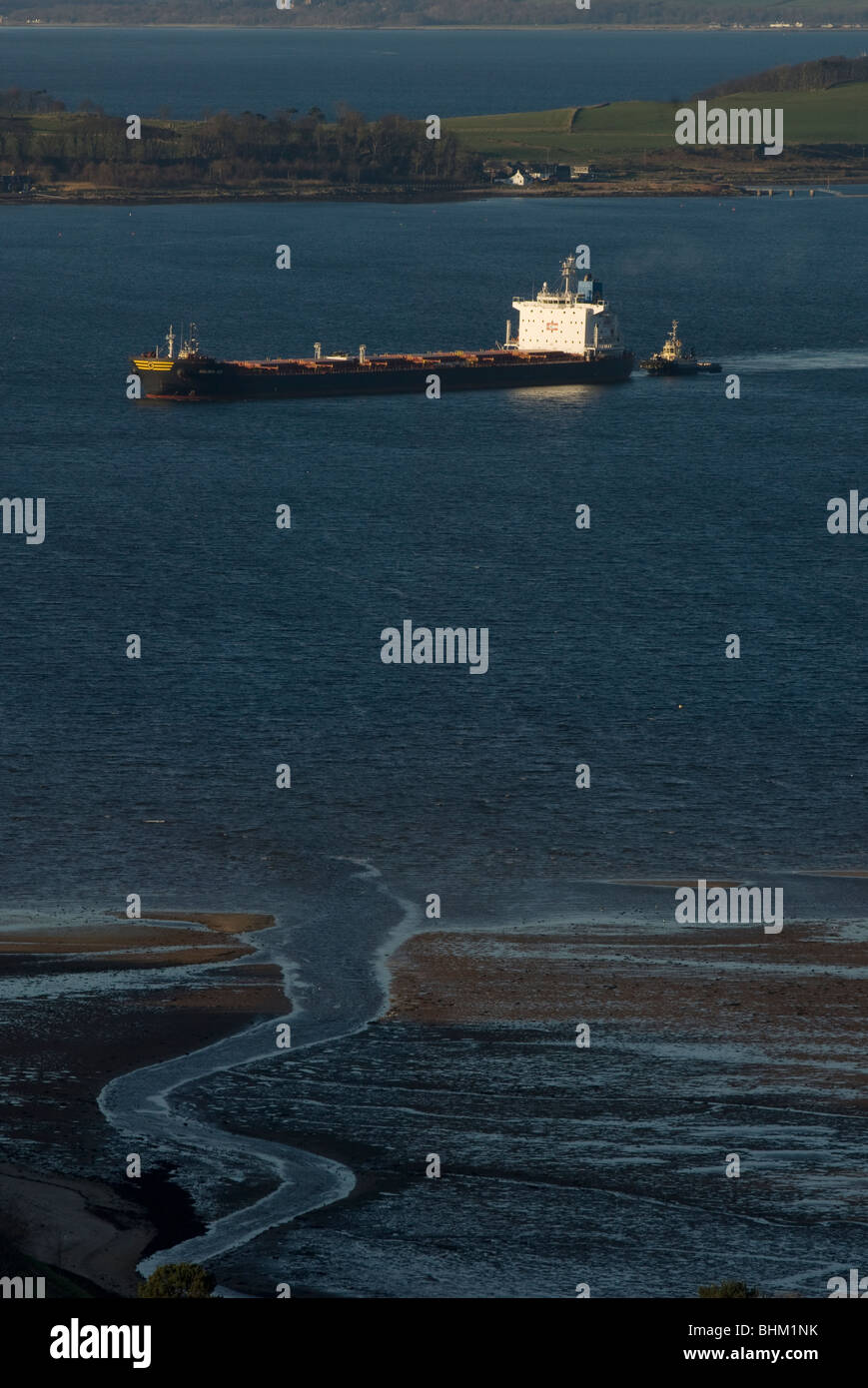A ship carrying coal arrives at the Hunterston Port coal reserve on the ...