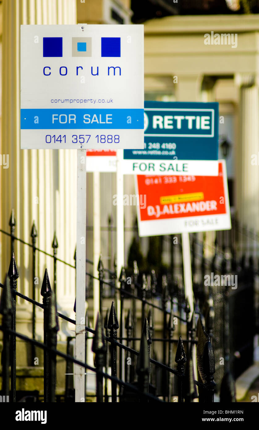 Estate agent for sale signs Stock Photo - Alamy