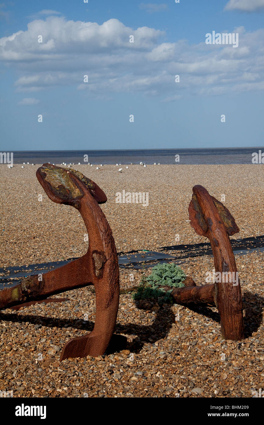 Rusty anchors on a beach Stock Photo - Alamy