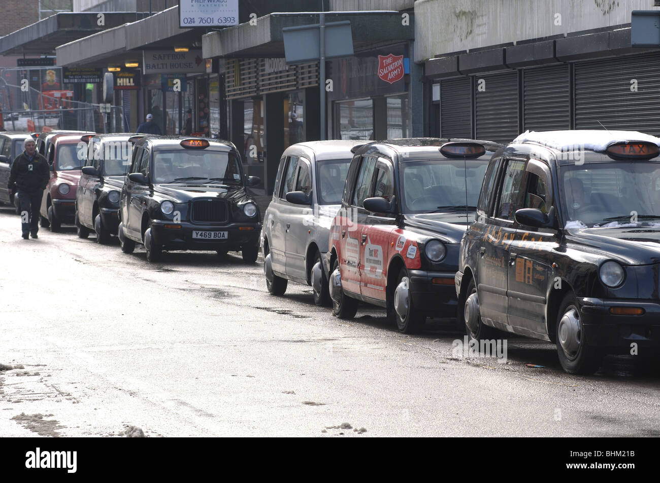 Taxis in Coventry city centre, England, UK Stock Photo - Alamy